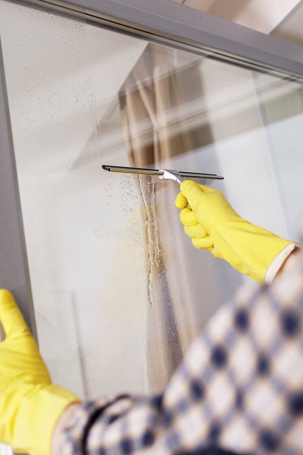 Man cleaning windows stock photo. Image of casual, cleaning - 73821720