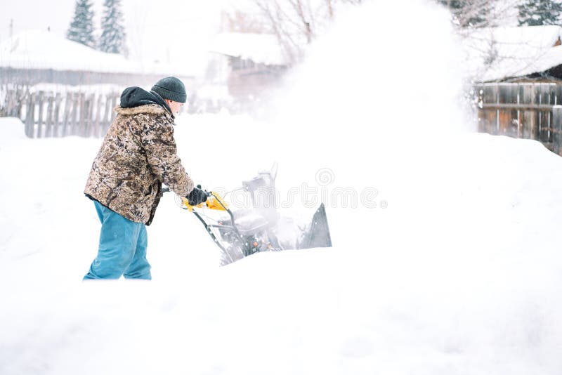 Man Clearing Snow with a Snow Blower Stock Image - Image of thrower ...
