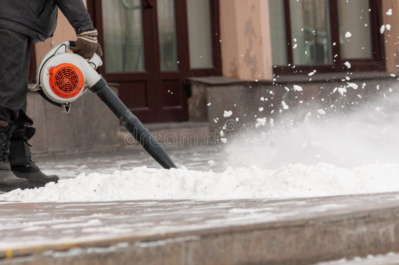 Man Cleans Street from Snow with Blower Stock Photo - Image of product ...