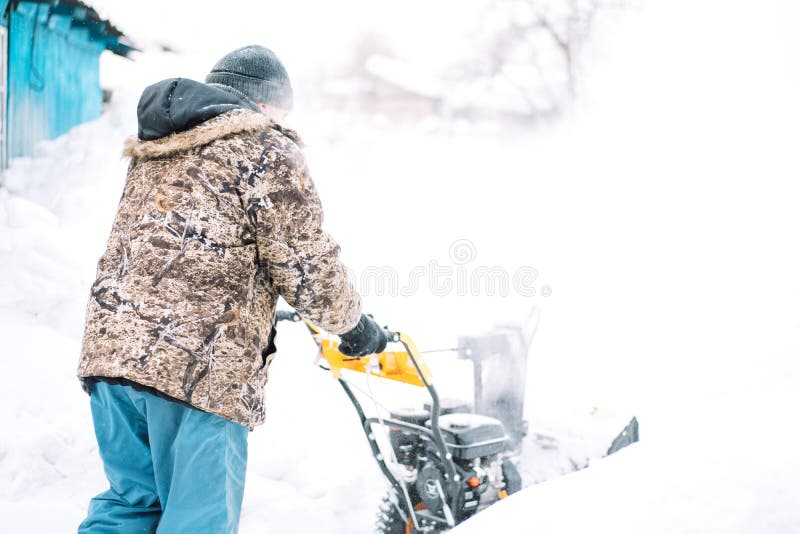 Man Clearing Snow with a Snow Blower Stock Image - Image of thrower ...