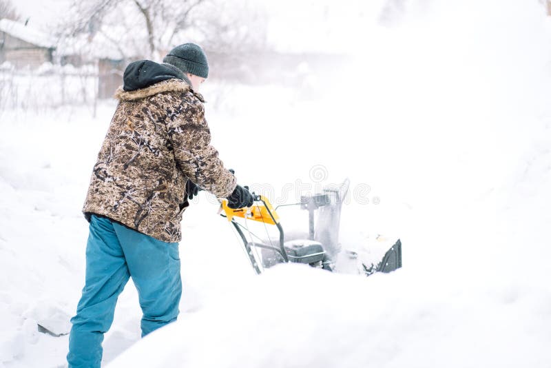 Man Clearing Snow with a Snow Blower Stock Image - Image of thrower ...