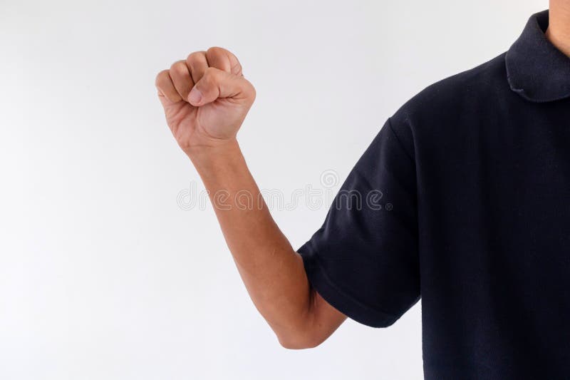 A Man Clenched His Right Fist Upwards on a White Background Stock Photo ...