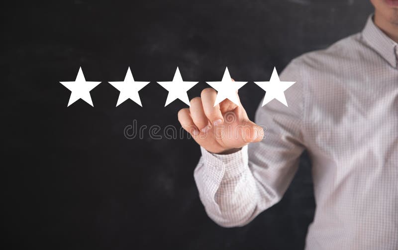 A Man Clicks on the Icon of the Stars. Concept Evaluation Stock Image ...