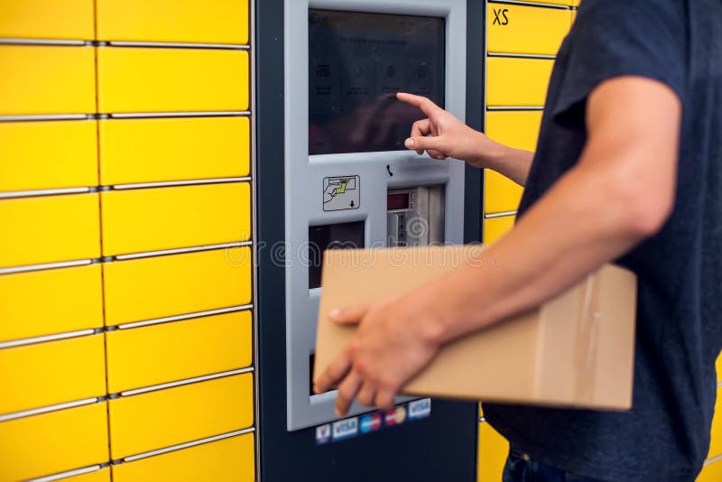 Client Using Automated Self Service Post Terminal Machine or Locker To ...