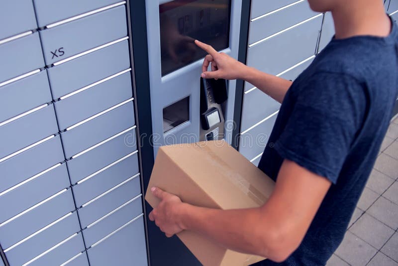 Client Using Automated Self Service Post Terminal Machine or Locker To ...