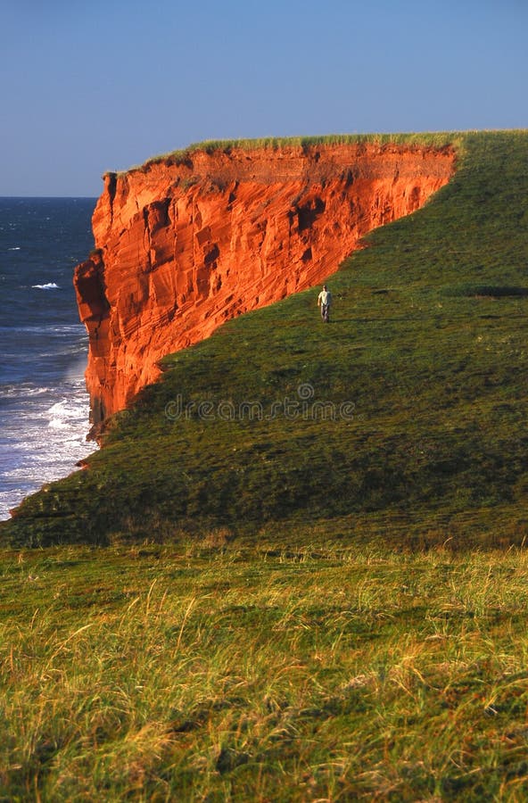 Man on Cliff stock image. Image of sandstone, canada, small - 1541949