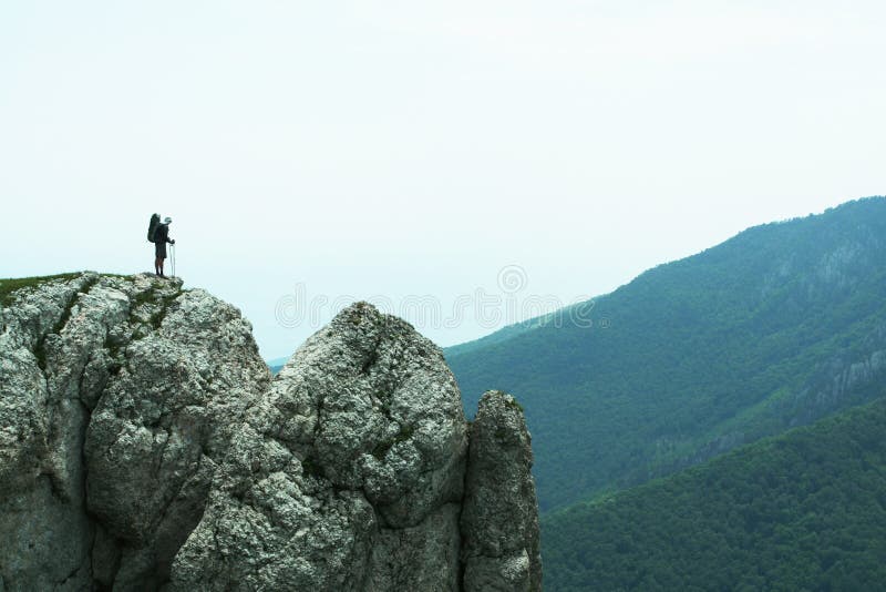 Man Explorer Standing on Cliff Alone Mountain Summit Stock Image ...