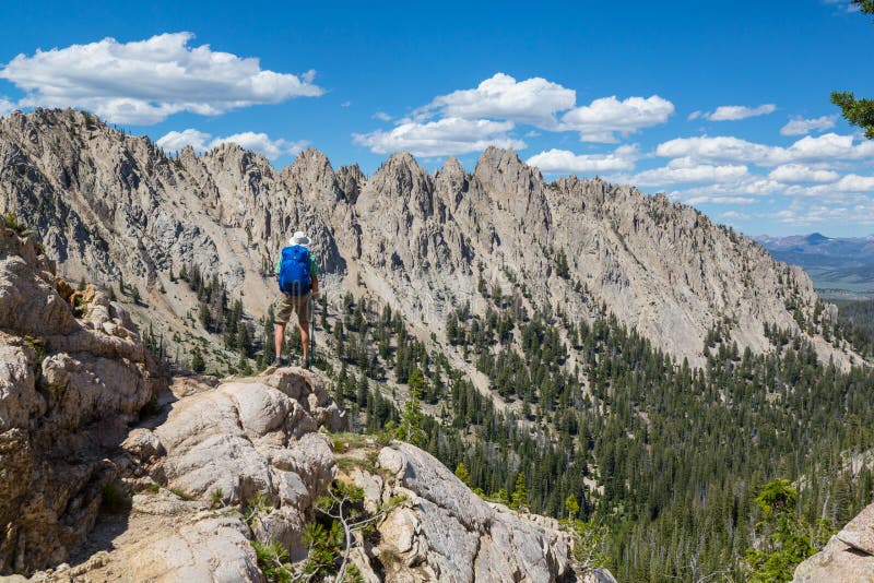 Man on the cliff stock image. Image of hike, destination - 254242551