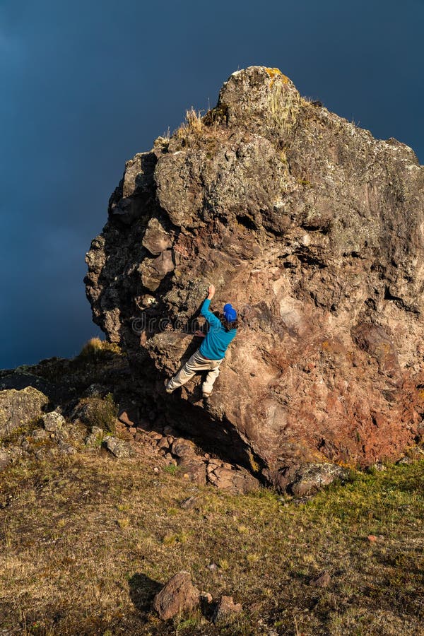 Man climbing a rock stock photo. Image of sport, shadow - 129883830