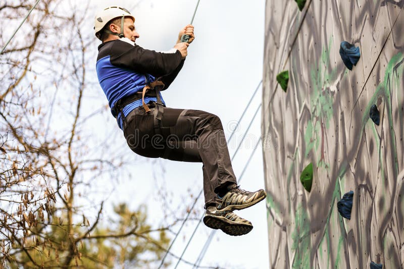Man Climbing Up a Wall in an Exercise Stock Image - Image of adventure ...