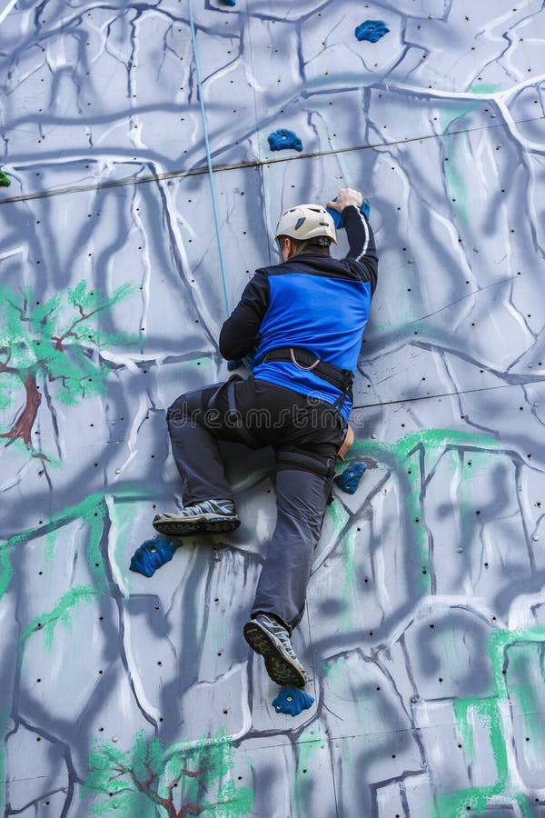 Man Climbing Up a Wall in an Exercise Stock Image - Image of adventure ...