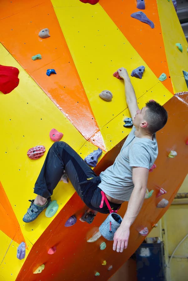 Man Climbing Up stock photo. Image of hang, activity - 155527944