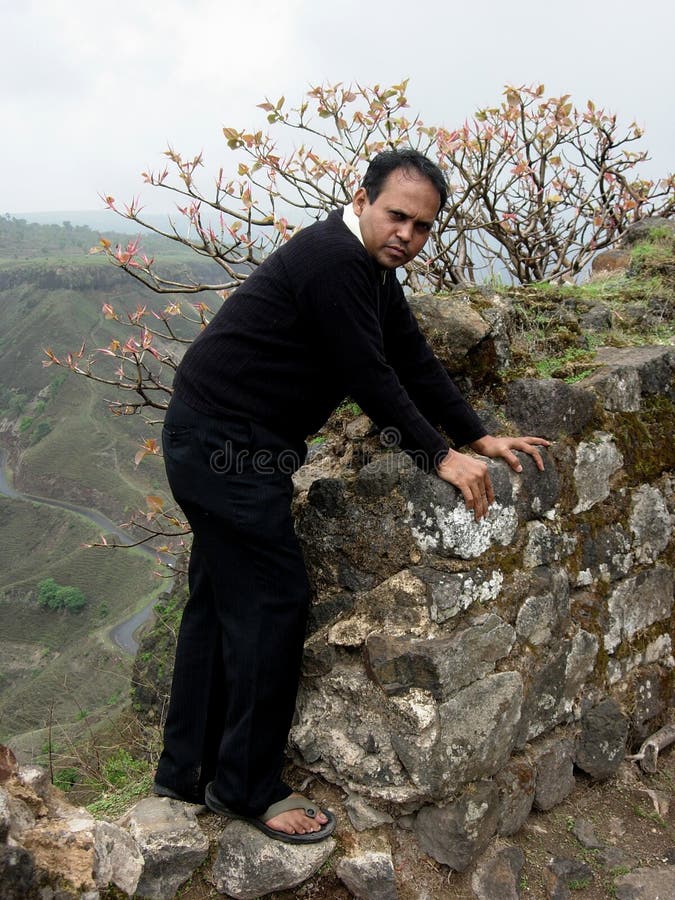 Man Climbing Wall in Country Stock Image - Image of stones, high: 5475737