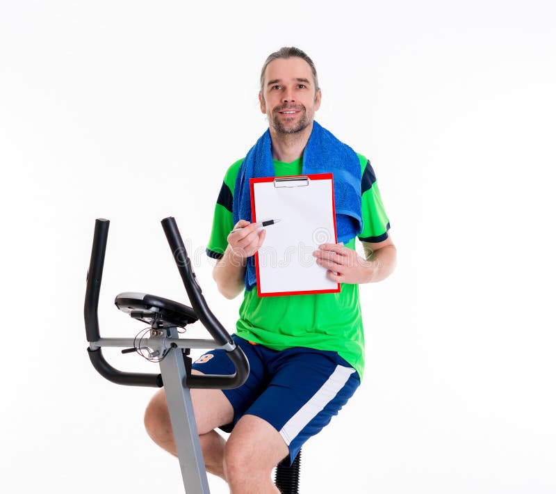 Man with Clipboard Train on Fitness Machine Stock Image - Image of ...