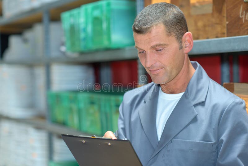 Man with Clipboard Writing Report Stock Image - Image of file, writing ...