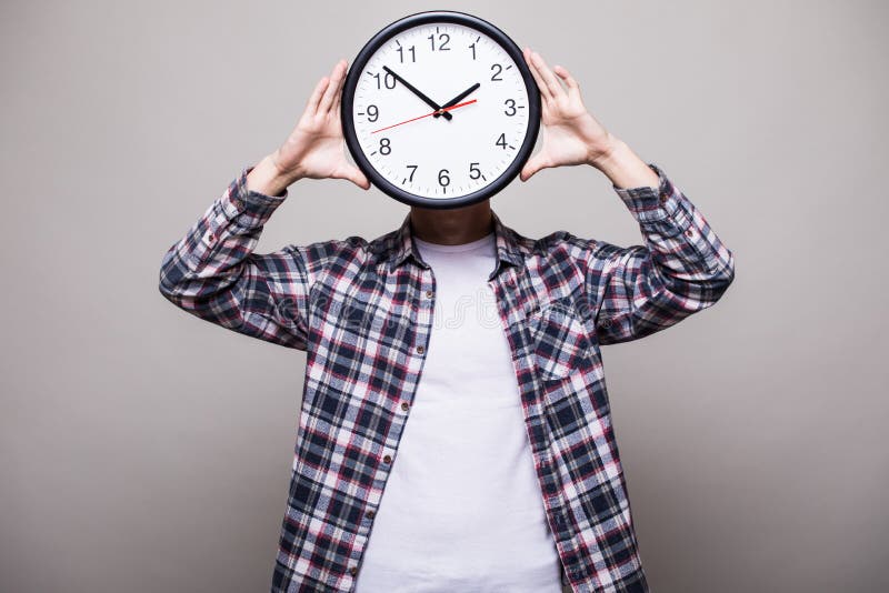 Man with clock over head stock photo. Image of expressive - 82195798