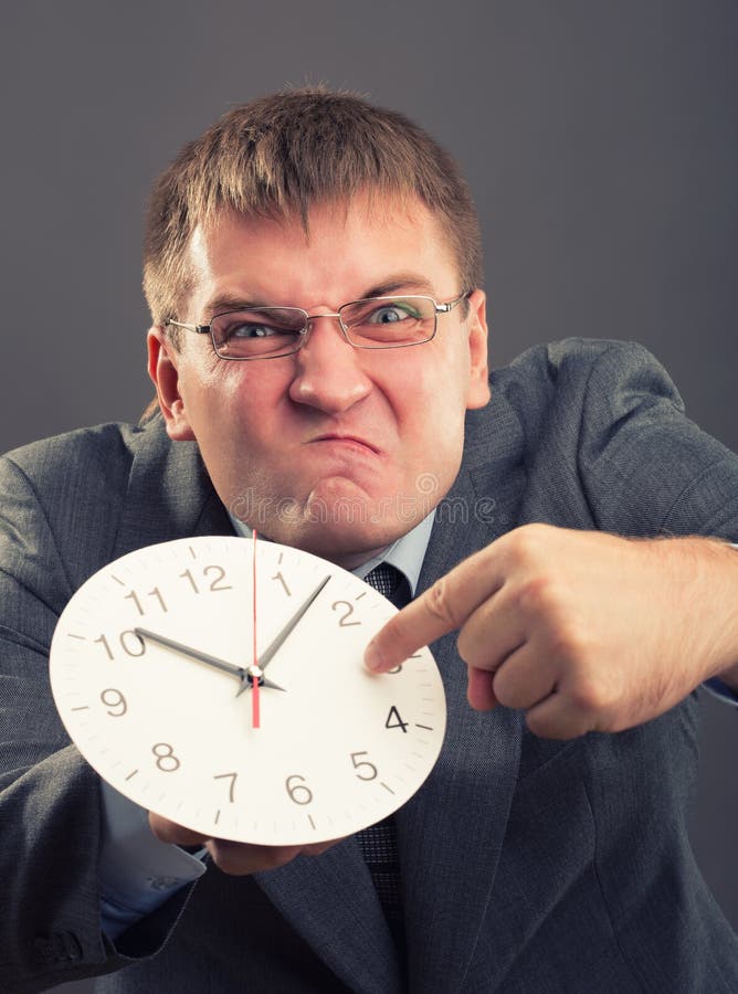 Businessman, Executive, Leader Holding a Clock, Very Determined ...