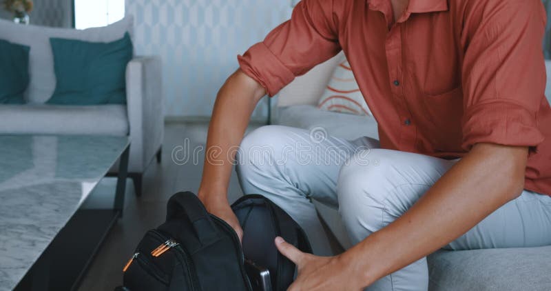 Man Closes His Laptop, Puts it Backpack, Leaves. Mobility Enables ... Man Closes His Laptop, Puts it Backpack, Leaves. Mobility Enables ...