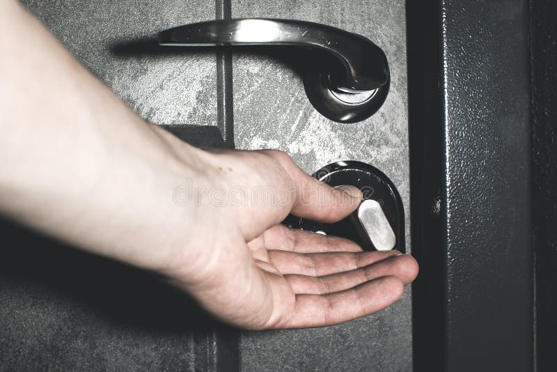 Man is Closing or Opening the Door Lock from the Inside. Security and ...