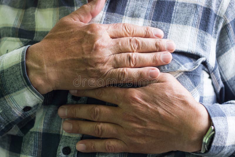 Man Clutching His Chest With His Hand Stock Photo - Image of attack ...