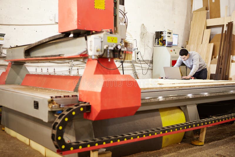 Man at the CNC Machine. Tool with Computer Numerical Control Stock ...
