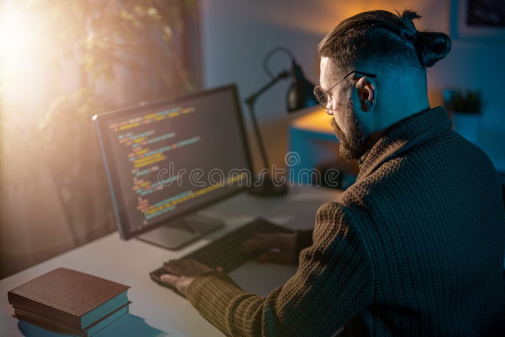Man coding on pc stock image. Image of desk, dark, desktop - 239529671