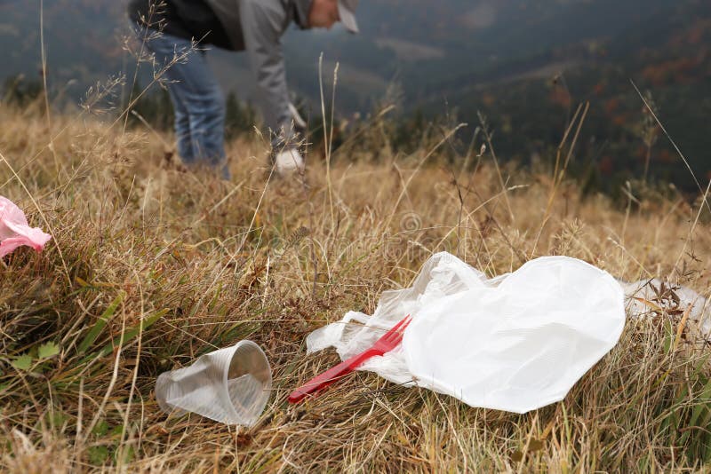 Man Collecting Garbage in Nature, Focus on Plastic Trash Stock Image ...