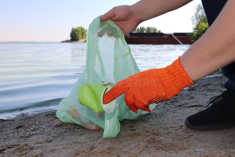 Garbage Collection on the Beach. Plastic and Packages Scattered on the ...