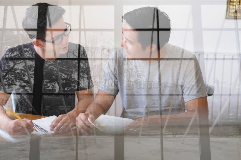 Discussing on assignment stock photo. Image of drink - 33958528