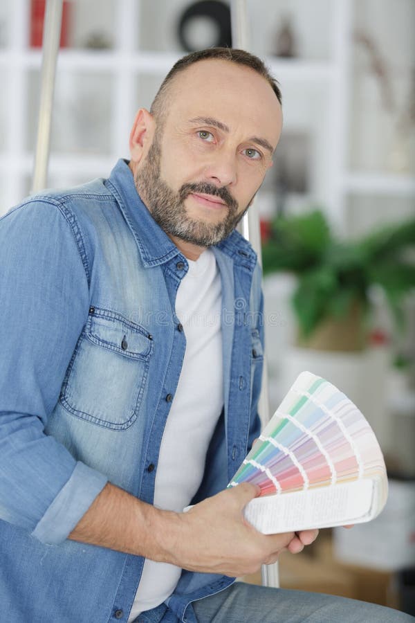 Man with color swatch stock image. Image of inspiration - 336983703
