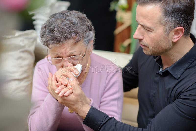 Man Comforting Weeping Elderly Lady Stock Photo - Image of compassion ...