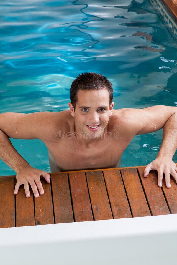 Man coming out of the pool stock image. Image of healthy - 65088095