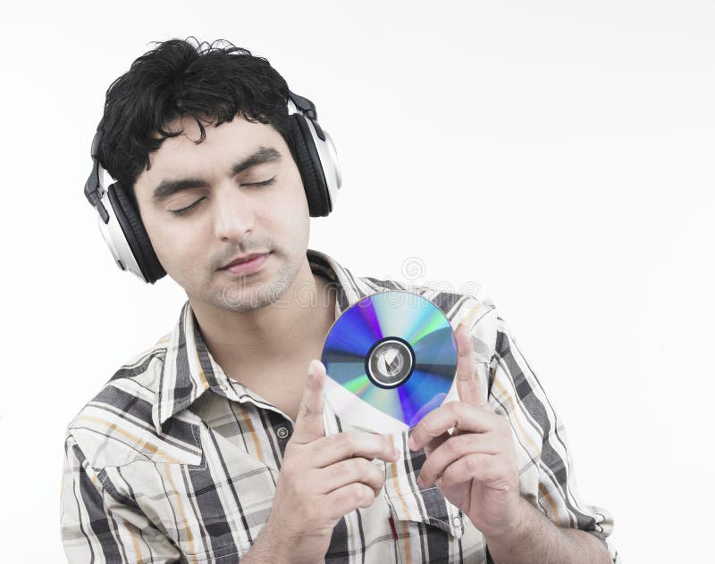 Man with a compact disc stock image. Image of grooving - 7252923