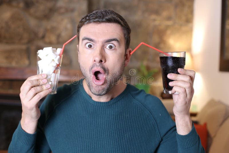 Man Comparing Classic Soda with Sugar Cubes Stock Image - Image of ...