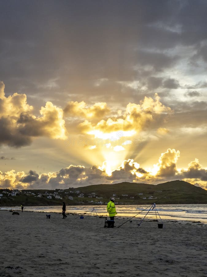 20 Man are Competing in a Fishing Competition on the Beach. Stock Image ...