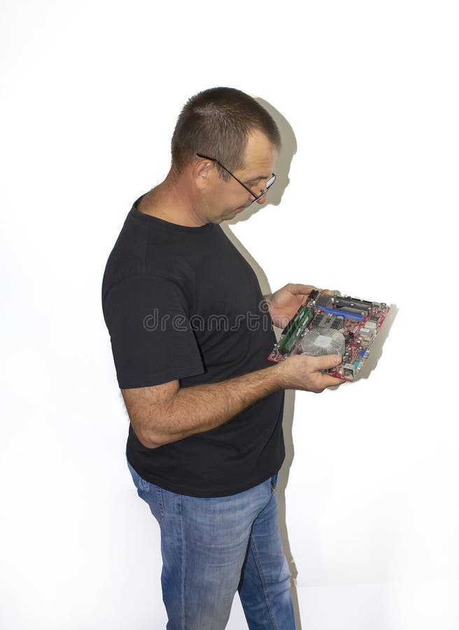 Man with a Computer Board, Programmer, Computer Technician Stock Image ...