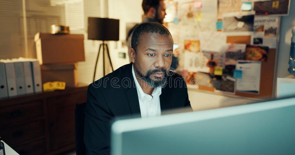 Man, Computer and Detective with Reading for Case, Search for Lead or ...