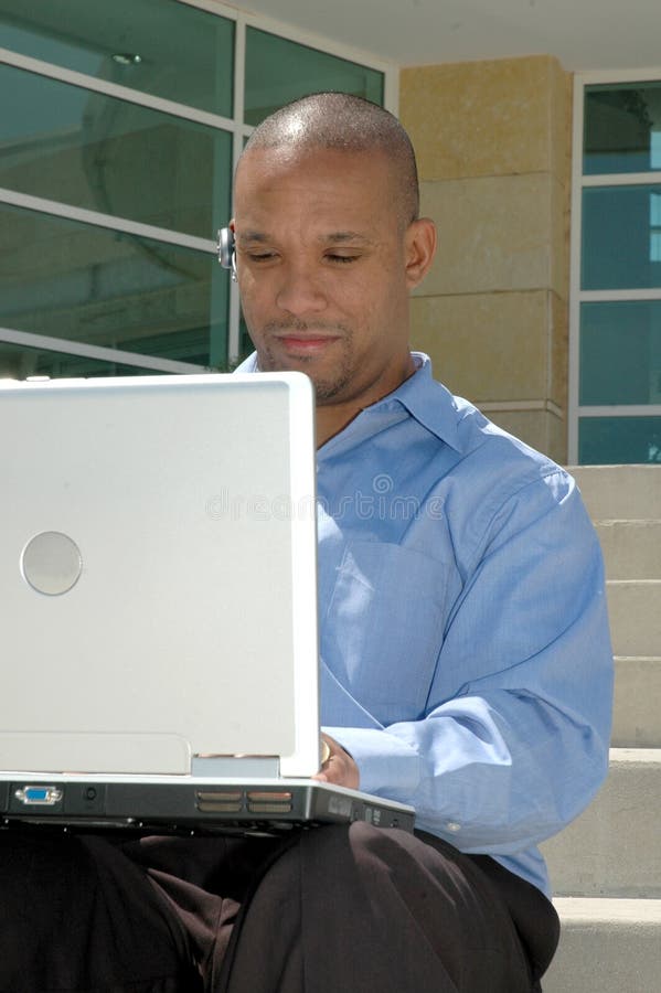 Man on Computer Outside stock photo. Image of gadgets, deal - 676256