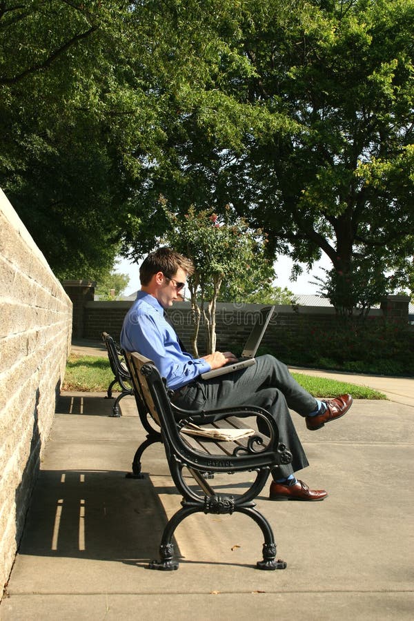 Man and Computer at Park stock photo. Image of business - 1245282