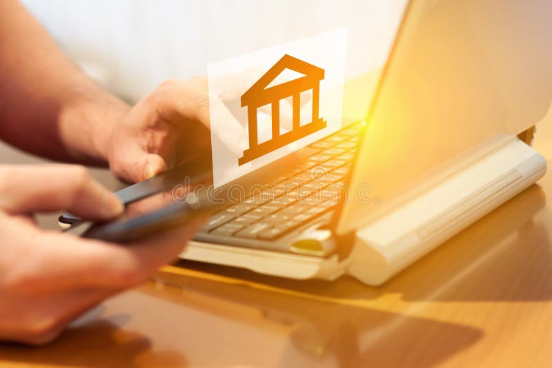 A Man on a Computer Selects a Bank for Investment. Investment Site ...