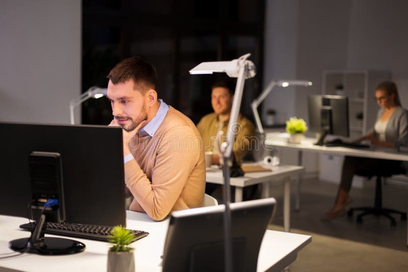 Man with Computer Working Late at Night Office Stock Photo - Image of ...