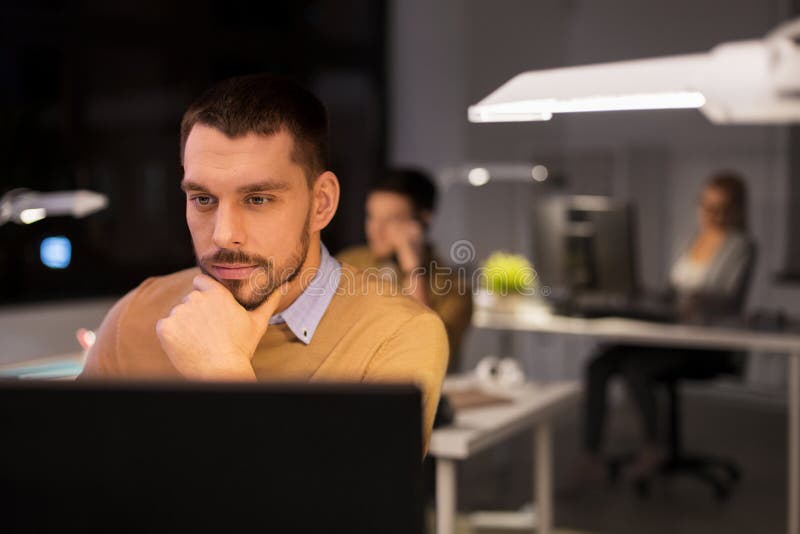 Man with Computer Working Late at Night Office Stock Image - Image of ...