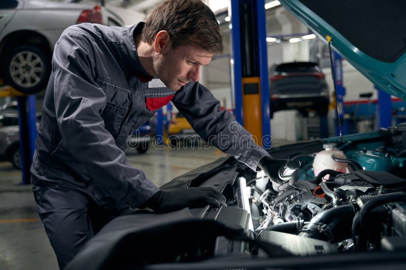 Man Conducts Full Technical Check of Auto Stock Image - Image of ...