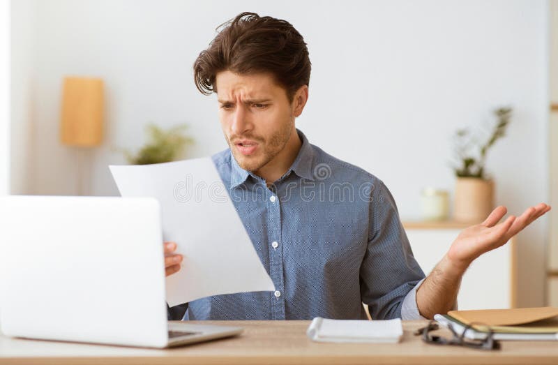 833 Confused Man Reading Desk Stock Photos - Free & Royalty-Free Stock ...
