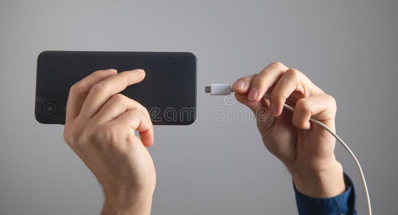 Man Connect Cable To Smartphone. Charging Stock Photo - Image of ...