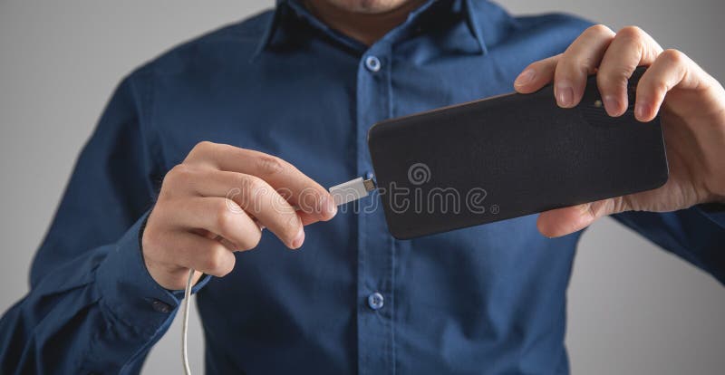 Man Connect Cable To Smartphone. Charging Stock Photo - Image of charge ...