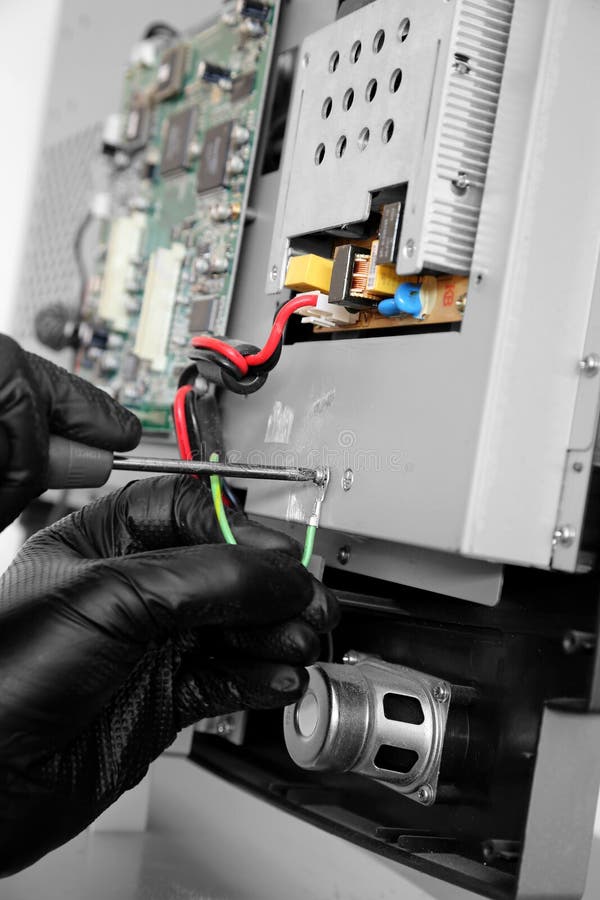Man Connecting an Earth Cable Onto a Flat Screen Television Stock Image ...