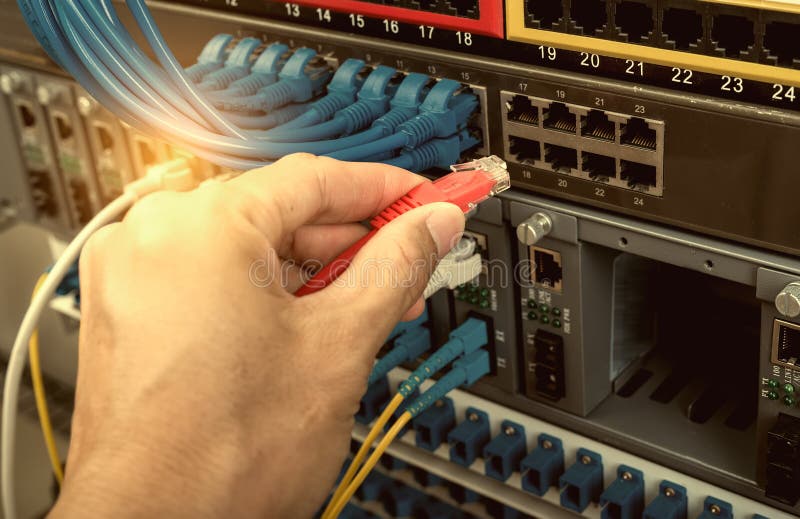 Man Connecting Fiber Network Cables Stock Photo - Image of center ...