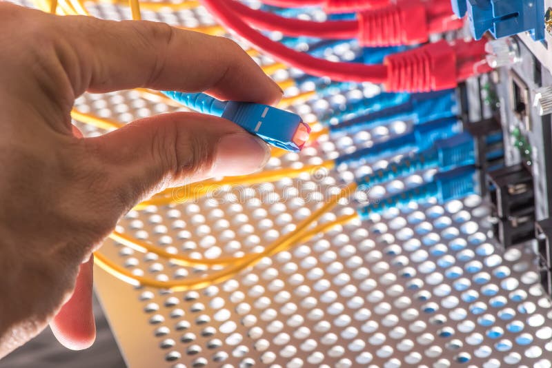 Man Connecting Fiber Network Cables Stock Photo - Image of center ...
