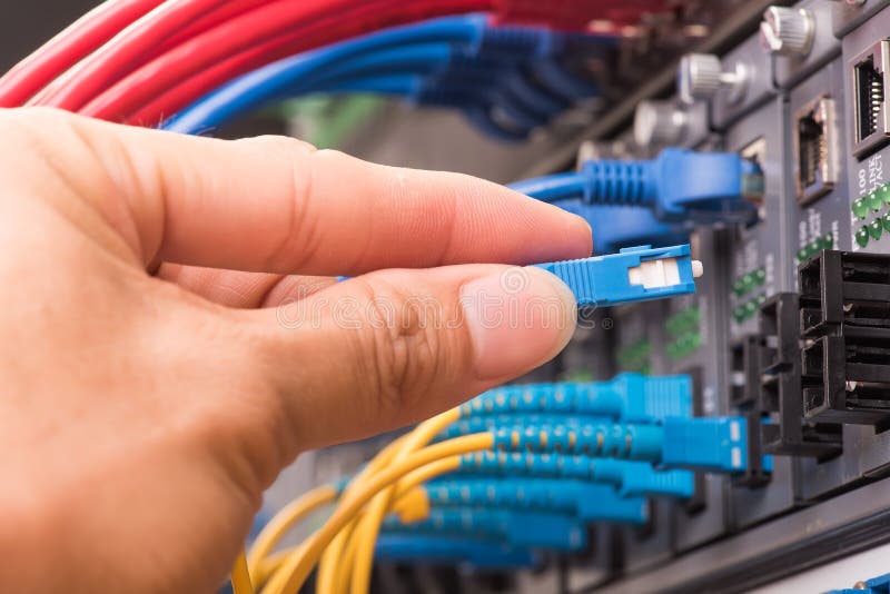 Man Connecting Fiber Network Cables Stock Photo - Image of center ...